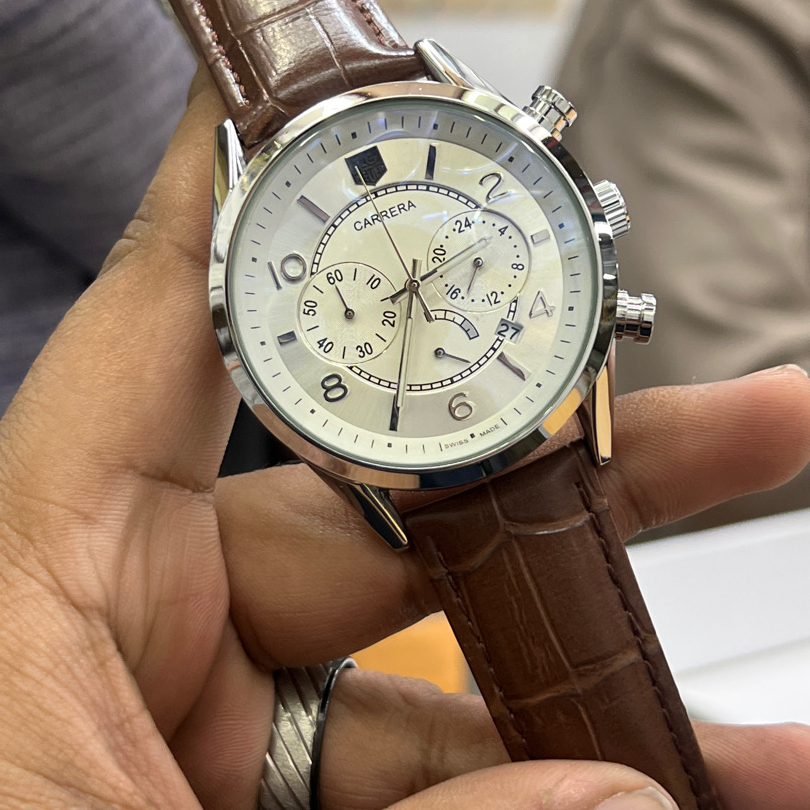 TAG BELT NUMBER DIGIT SILVER BODY BROWN BELT,WHITE DIAL RUBEL | Watch ...